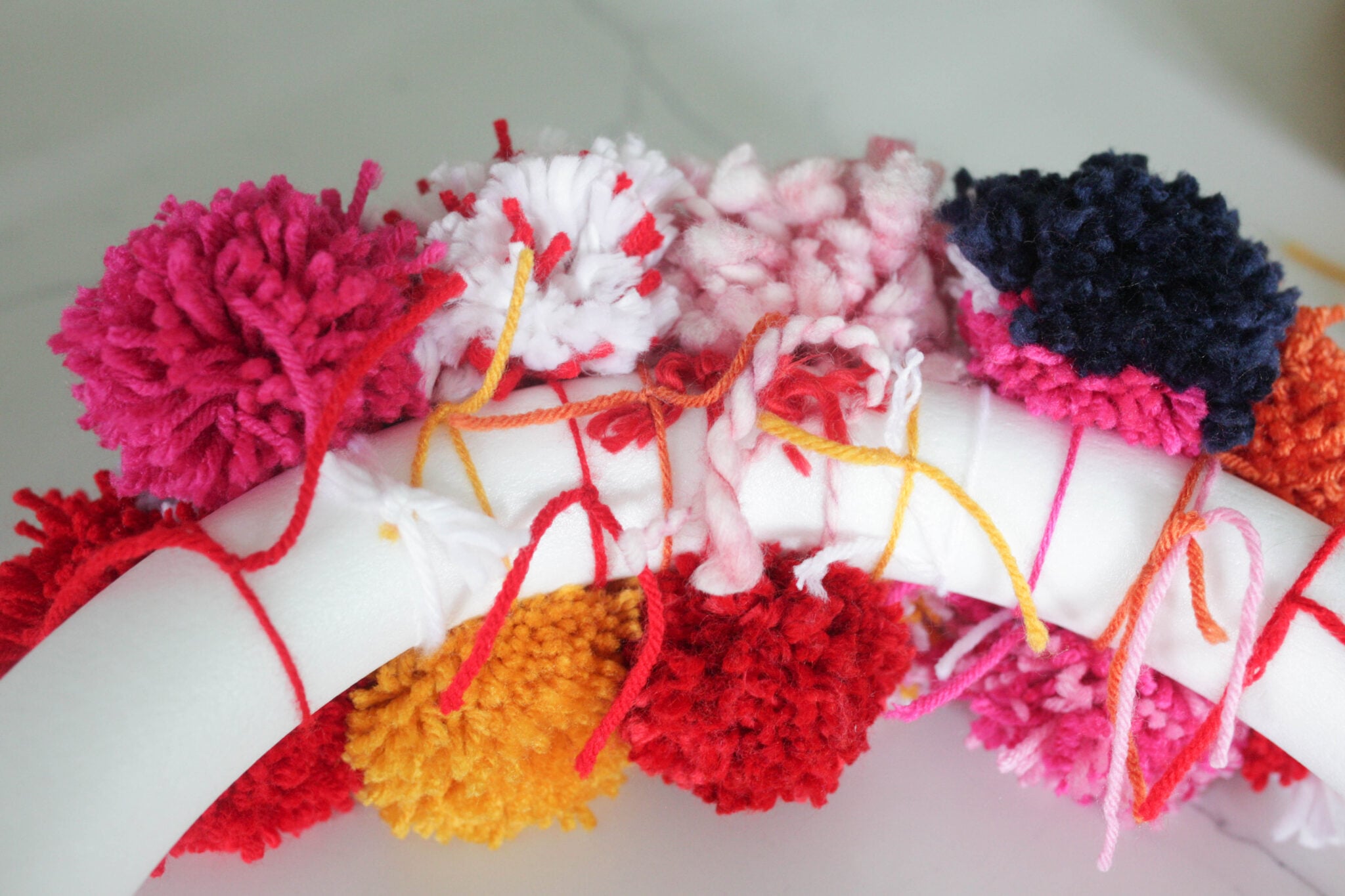 Easy Pom Pom Wreath DIY - Paisley & Sparrow